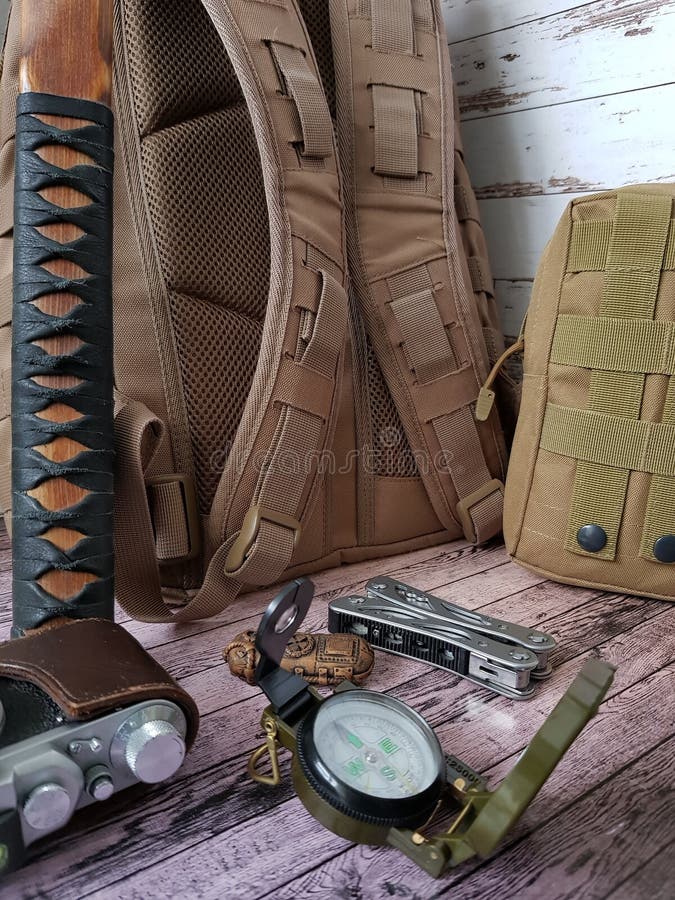 Compass, Multitool and Backpack for Hiking Stock Photo - Image of time ...