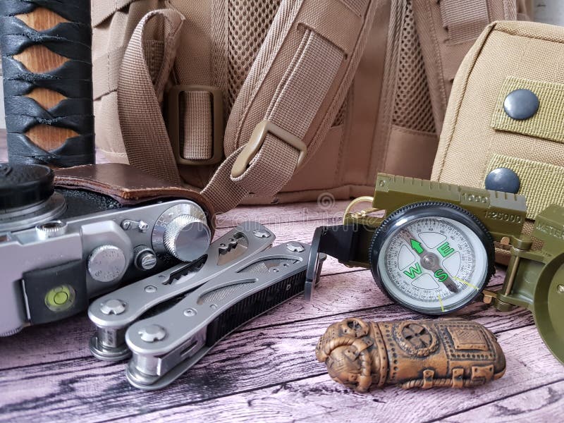 Compass, Multitool and Backpack for Hiking Stock Image - Image of ...