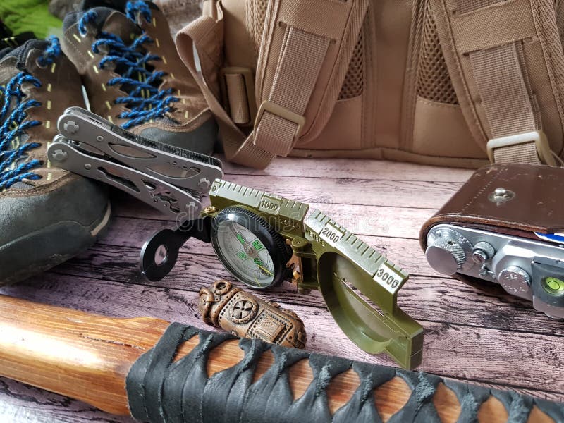 Compass, Multitool and Backpack for Hiking Stock Image - Image of hike ...