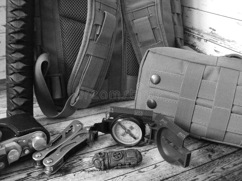 Compass, Multitool and Backpack for Hiking Stock Photo - Image of ...