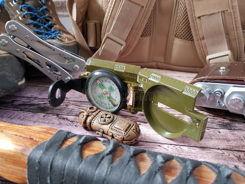 Compass, Multitool and Backpack for Hiking Stock Image - Image of ...