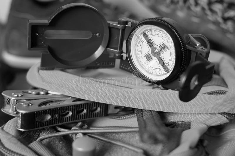 Compass and Multitool are on the Backpack Stock Image - Image of trip ...