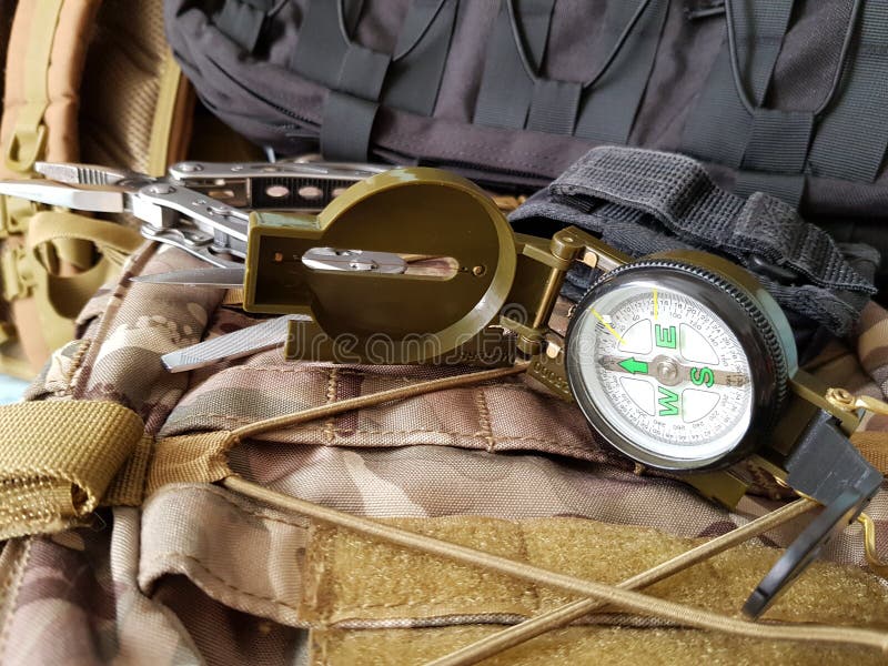 Compass and Multitool are in the Backpack Stock Photo - Image of hiking ...