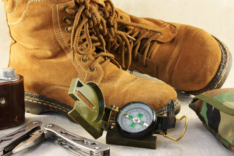 Compass, Multi-tool and Old Hiking Boots Stock Image - Image of concept ...