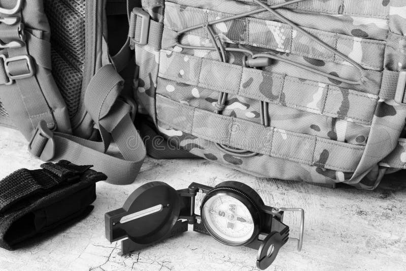 Compass and Multitool in a Backpack Stock Photo - Image of banking ...