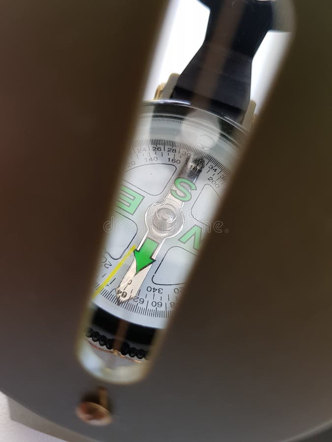 The Compass Needle Points North Stock Image - Image of compass, hike ...