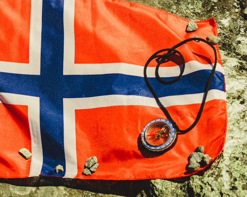Compass on norwegian flag stock image. Image of journey - 179898969