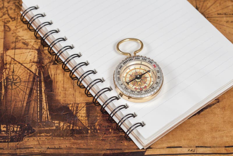 Compass on the note book stock image. Image of magnetic - 72290791
