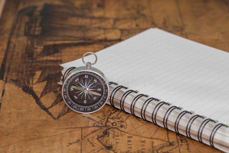 Compass with Note Book on Old Map Vintage Stock Photo - Image of ...
