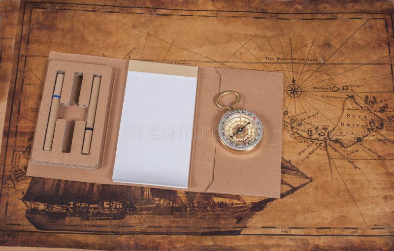 Compass with Note Book on Old Map Vintage Stock Photo - Image of ...