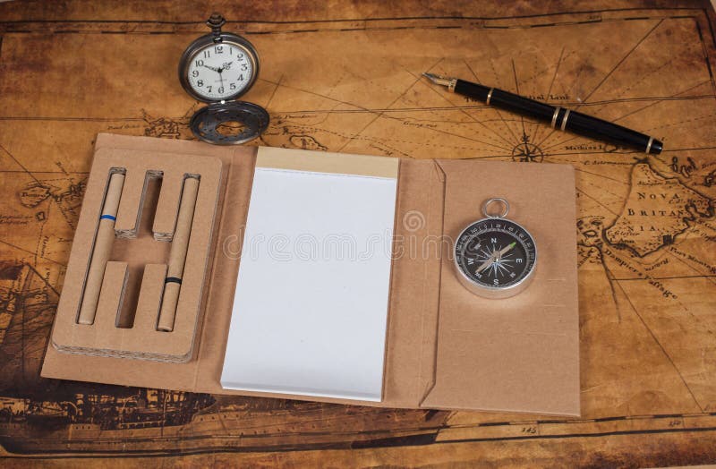 Compass with Note Book on Old Map Vintage Stock Image - Image of note ...