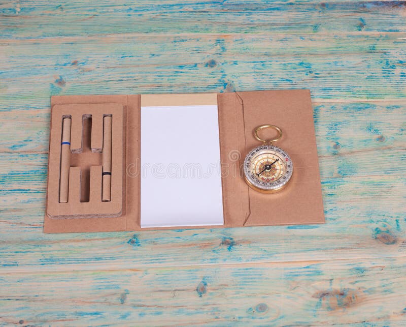 Compass with Note Book on Old Map Vintage Process Stock Image - Image ...