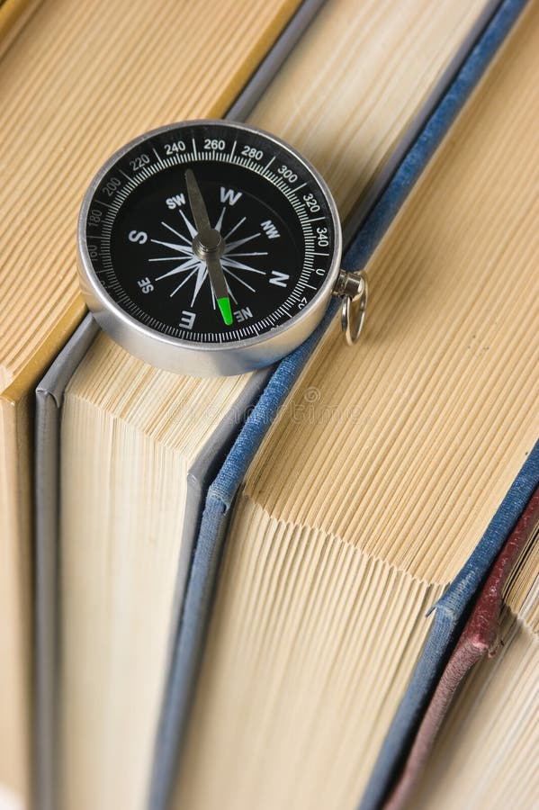 Compass and old books stock image. Image of objects - 157119929