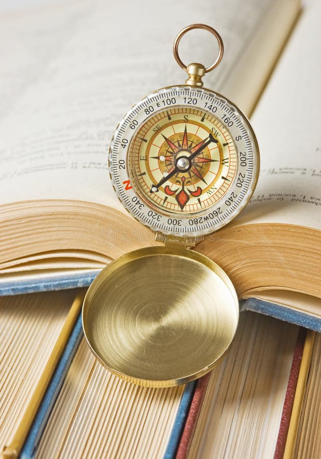 Compass and old books stock image. Image of university - 157123777