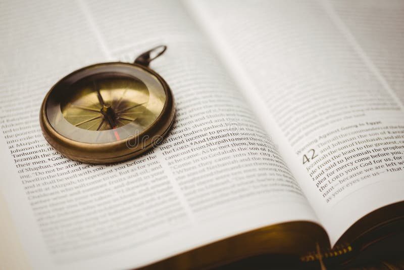 Compass on open bible stock photo. Image of holy, manuscript - 51086022