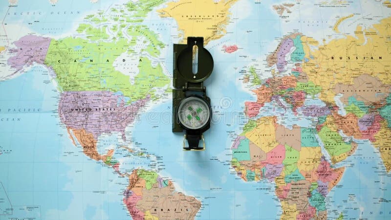 Compass in Operation on a World Map Stock Video - Video of compass ...