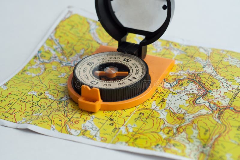 Compass and a map. stock image. Image of technology, icons - 29986385