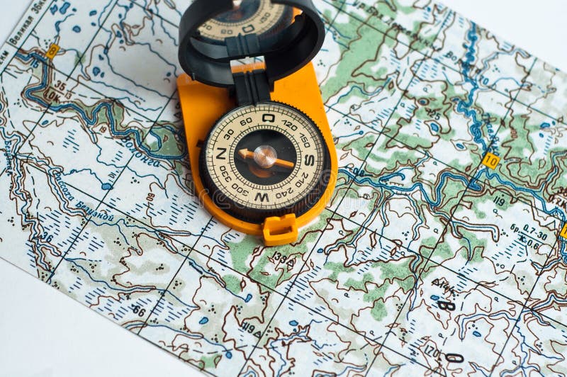 Compass and a map. stock image. Image of icons, symbol - 29986491