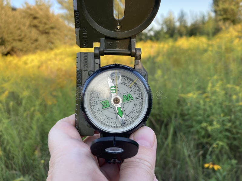 Compass for Orientation on the Terrain during a Hike Stock Image ...