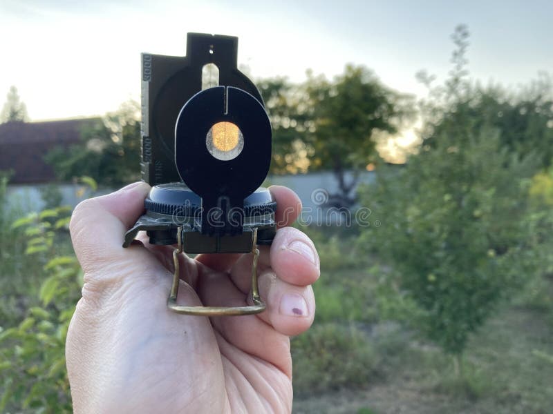 Compass for Orientation on the Terrain during a Hike Stock Photo ...