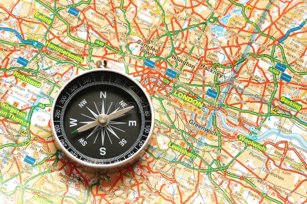 Compass over the map of UK stock photo. Image of instrument - 2698998