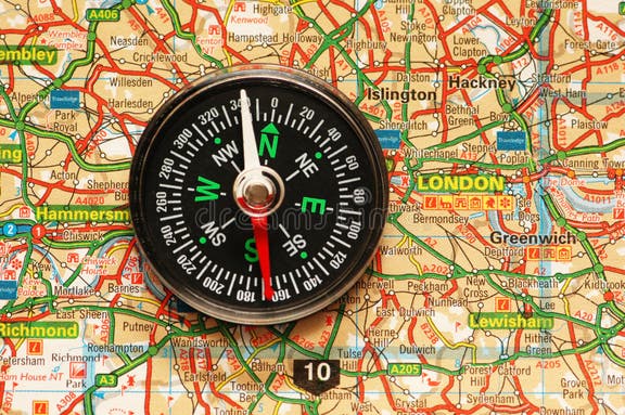 Compass over the map of UK stock photo. Image of leading - 3181402