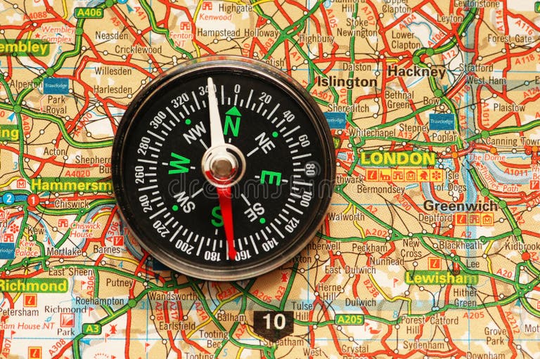 Compass over the map of UK stock photo. Image of leading - 3181402