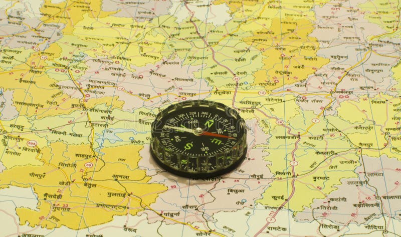 Isolated Magnetic Compass Over Map Stock Image - Image of roads ...