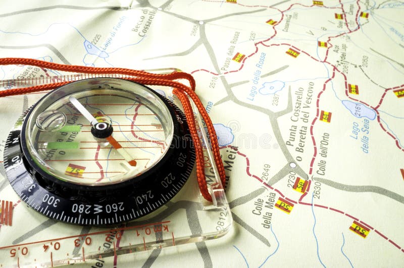 Compass Over a Trekking Map. Color Image Stock Image - Image of measure ...