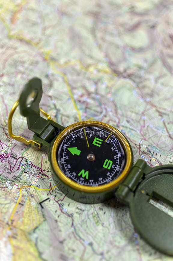 Compass on a paper map stock image. Image of north, exploration - 309446915