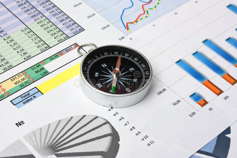Compass and paper work stock image. Image of investment - 124499659