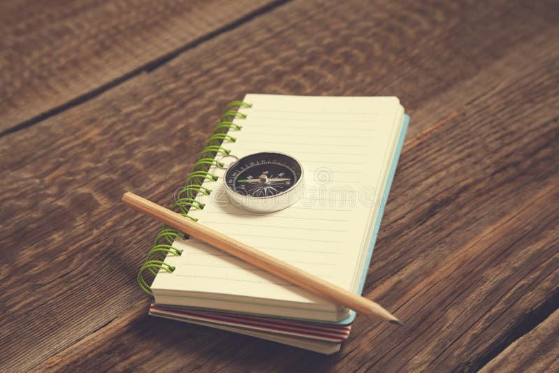 Compass and Pencil on Notepad on Wooden Desk Stock Image - Image of ...