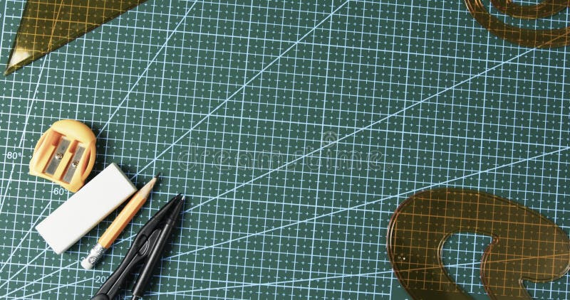 Compass, Pencil, Sharpener, Eraser and Rulers with Pad, in Slow Motion ...