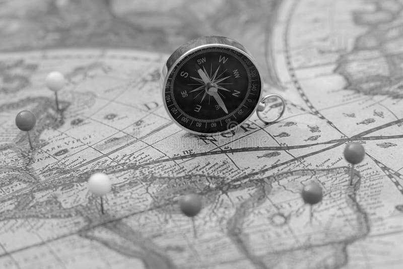 Compass and Pin Point Marking with Vintage Map Background Stock Photo ...