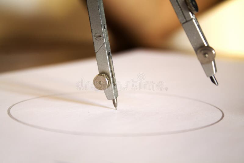 Compass Resting on Paper with Pencil Lead in Midair Stock Image - Image ...