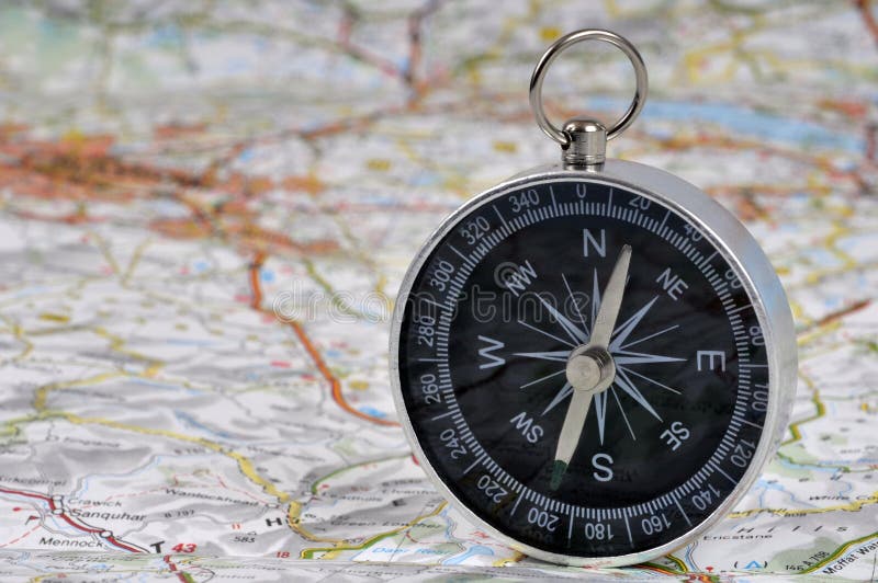 Compass on a road map stock image. Image of south, compass - 136956755