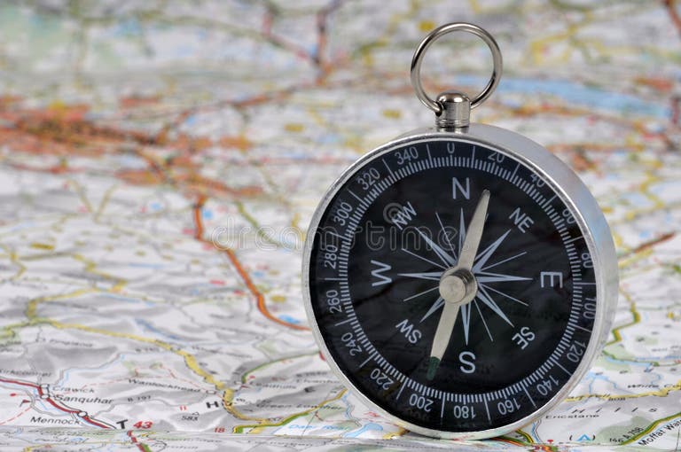 Compass on a road map stock image. Image of south, compass - 136956755