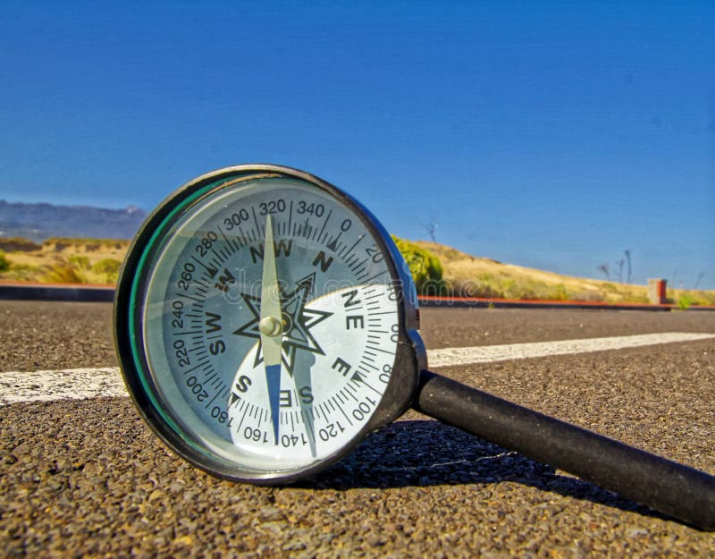 Compass on the Road stock image. Image of arrow, path - 134817347