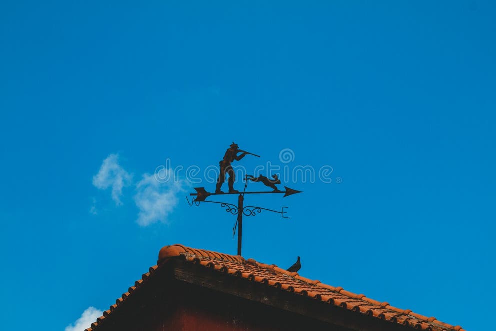 Compass on the roof stock image. Image of sign, north - 102707741