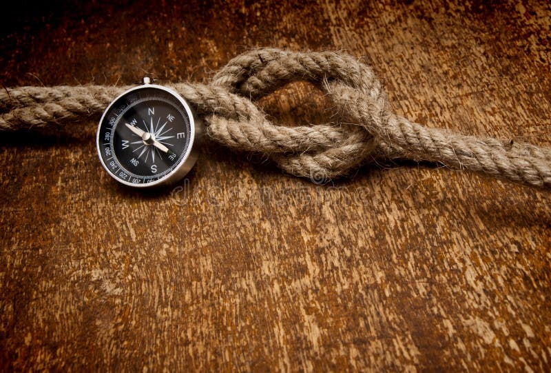 Maritime compass and rope stock photo. Image of mechanical - 35318802