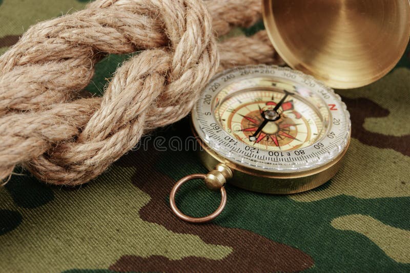 Compass and rope on map stock photo. Image of scout, east - 27907072