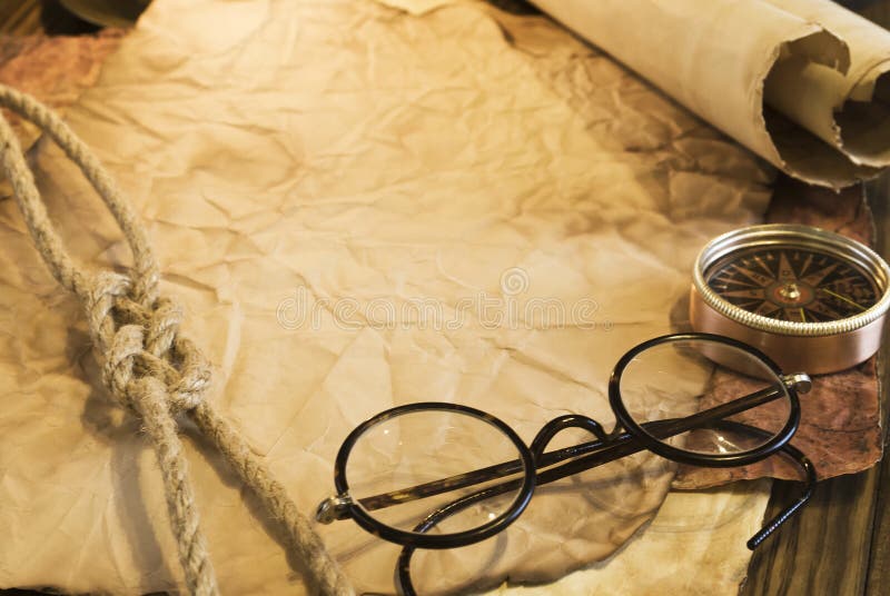 Compass, Rope and Glasses on Old Paper Stock Photo - Image of search ...