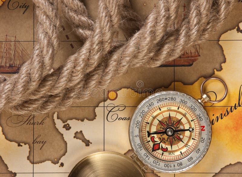Compass and rope on map stock photo. Image of scout, east - 27907072