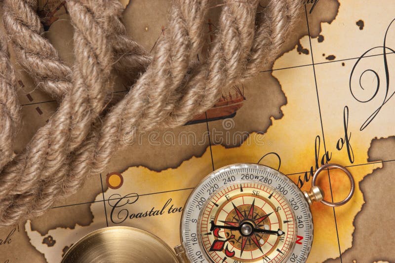Compass and rope on map stock photo. Image of cartographer - 159167102