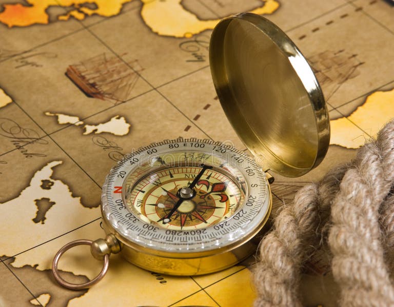 Compass and rope on map stock photo. Image of cartography - 158342486
