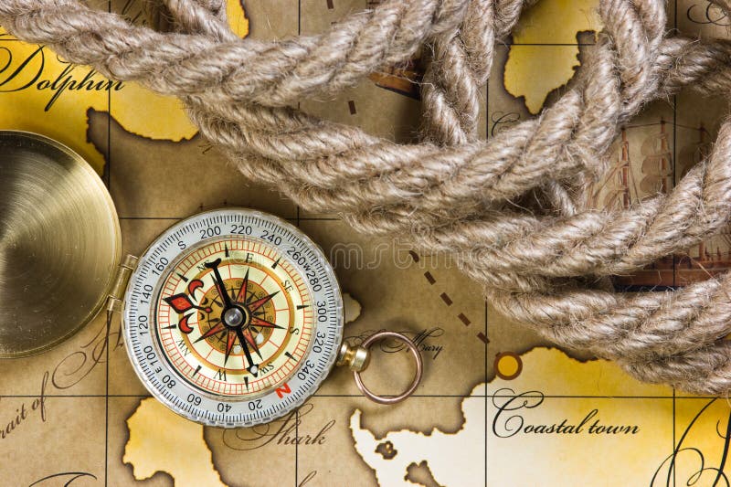 Compass and rope on map stock image. Image of cartography - 174321809