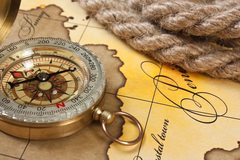 Compass and rope on map stock photo. Image of journey - 158346860