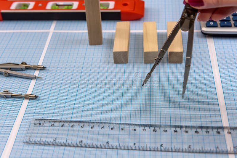 Compass with Ruler on Millimeter Paper Close Up Stock Image - Image of ...