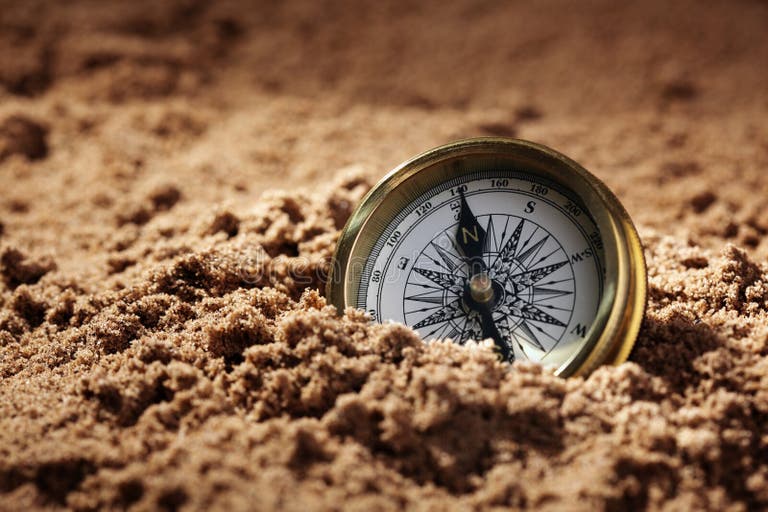 Compass in sand stock photo. Image of colour, journey - 28566178