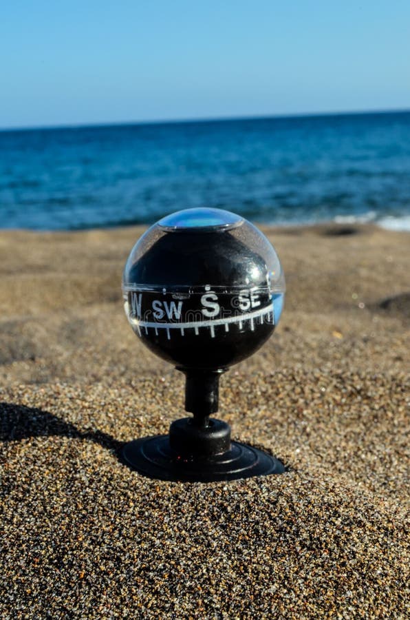 Compass on the Sand Beach stock illustration. Illustration of north ...